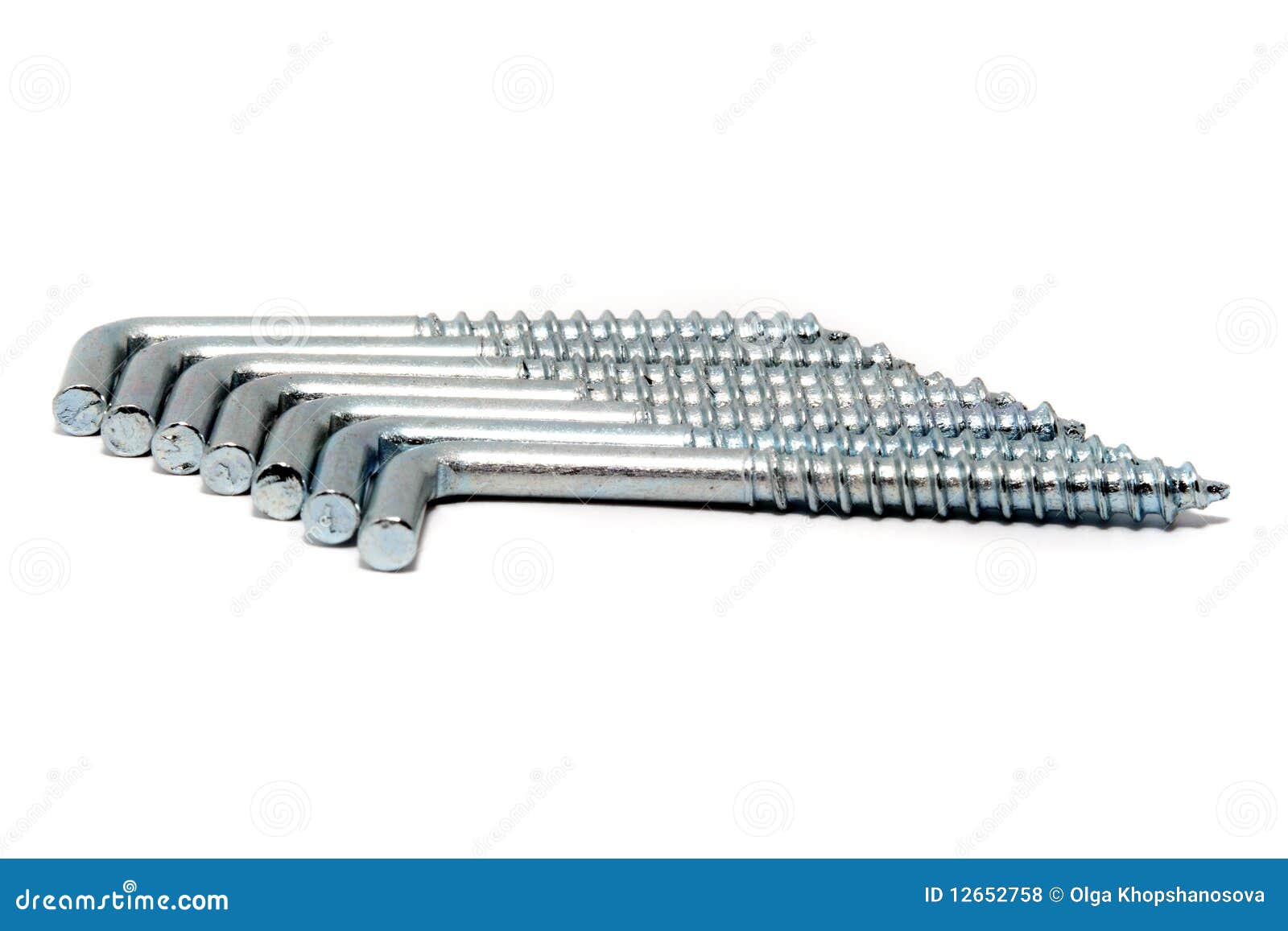 Silver screws in a raw stock photo. Image of objects - 12652758