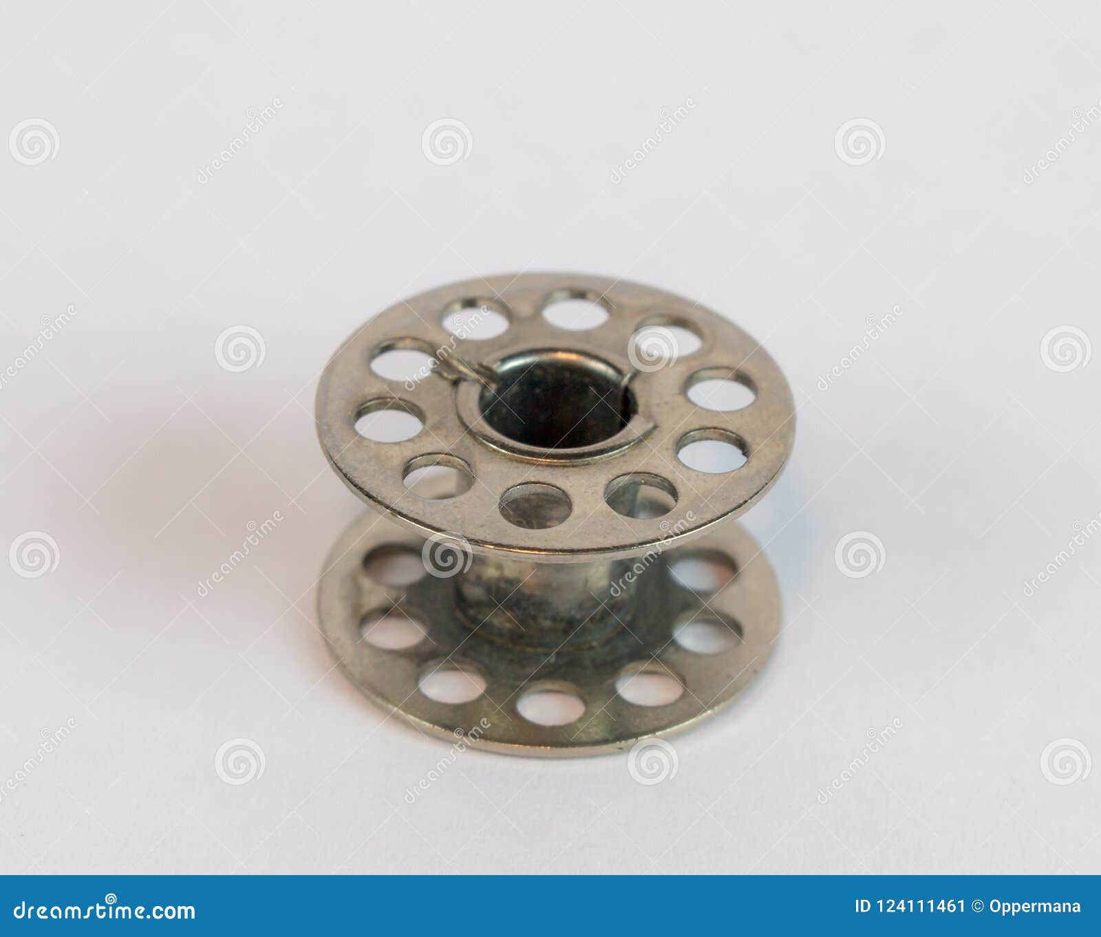 Silver Sewing Machine Bobbin White Stock Image - Image of macro, back ...