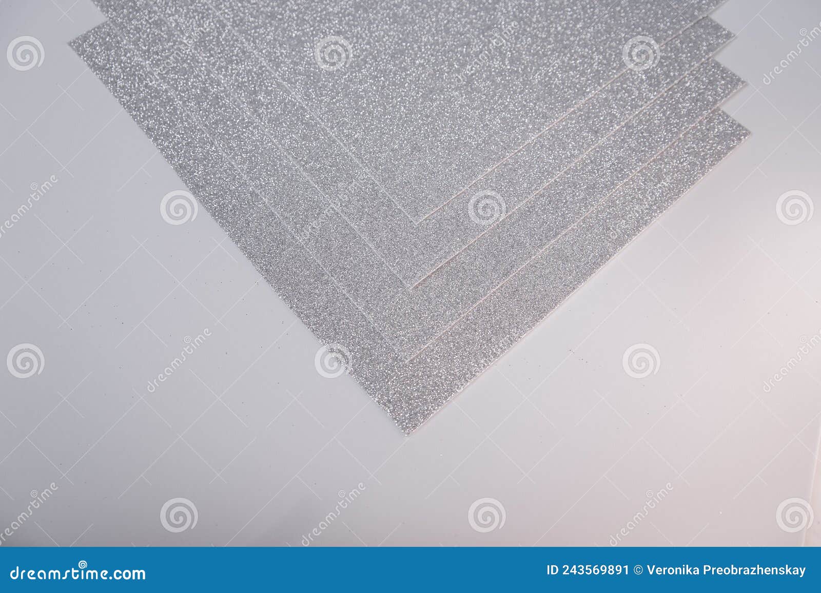 Silver Sheets of Cardboard with Sparkles on a White Background Stock ...
