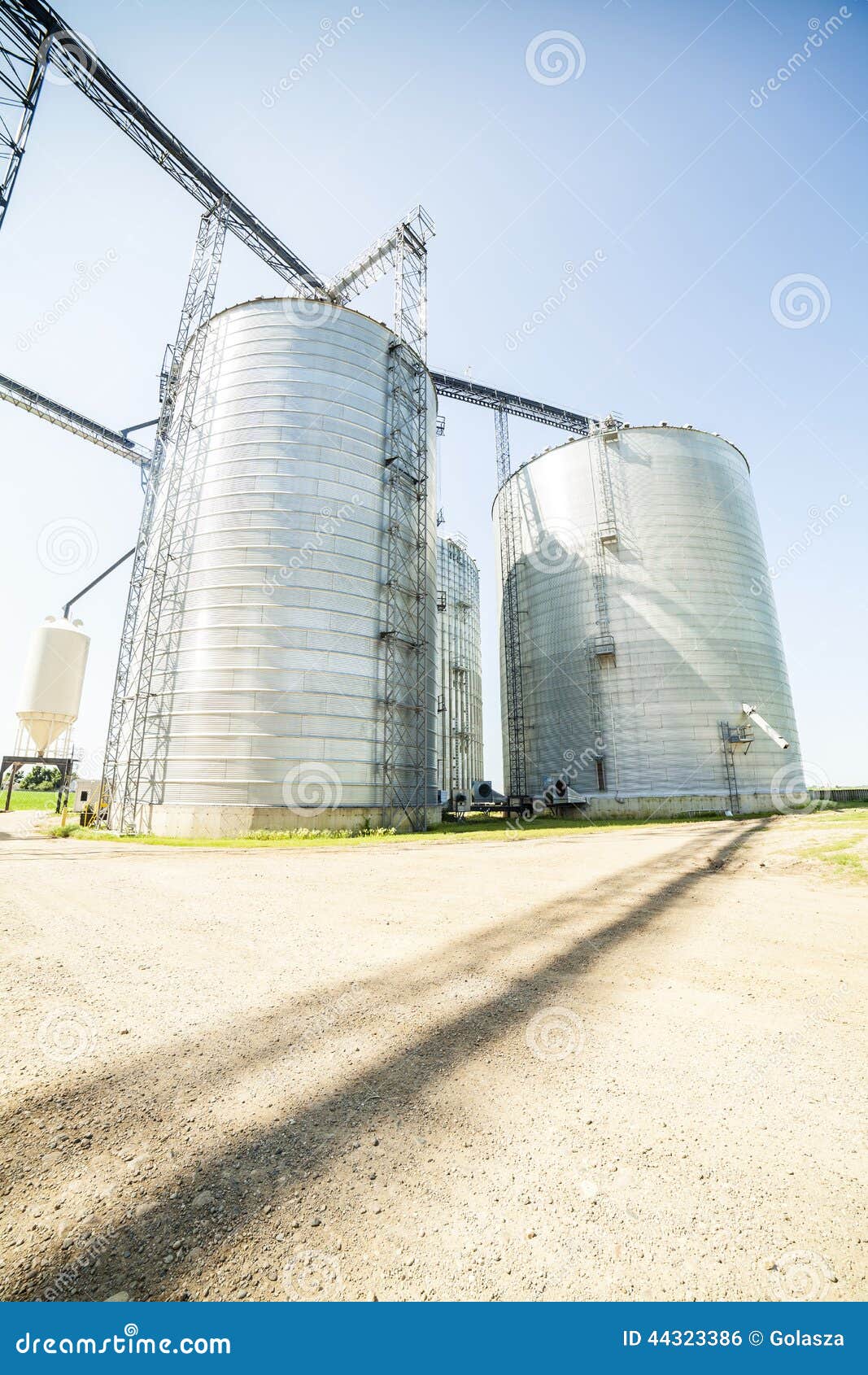 Silver, Shiny Agricultural Silos Stock Photo - Image of silver ...
