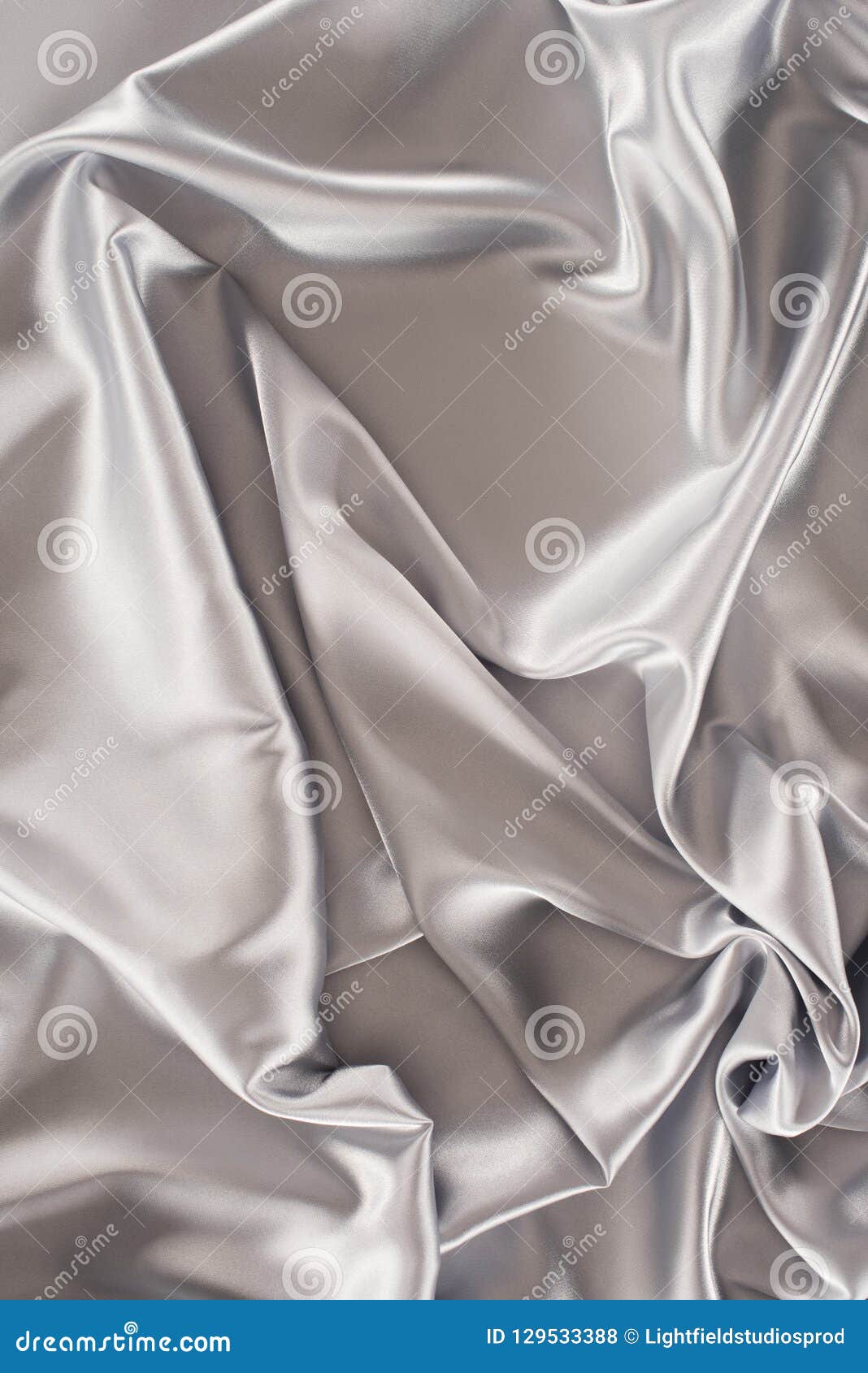 Silver shiny silk fabric stock photo. Image of silver - 129533388