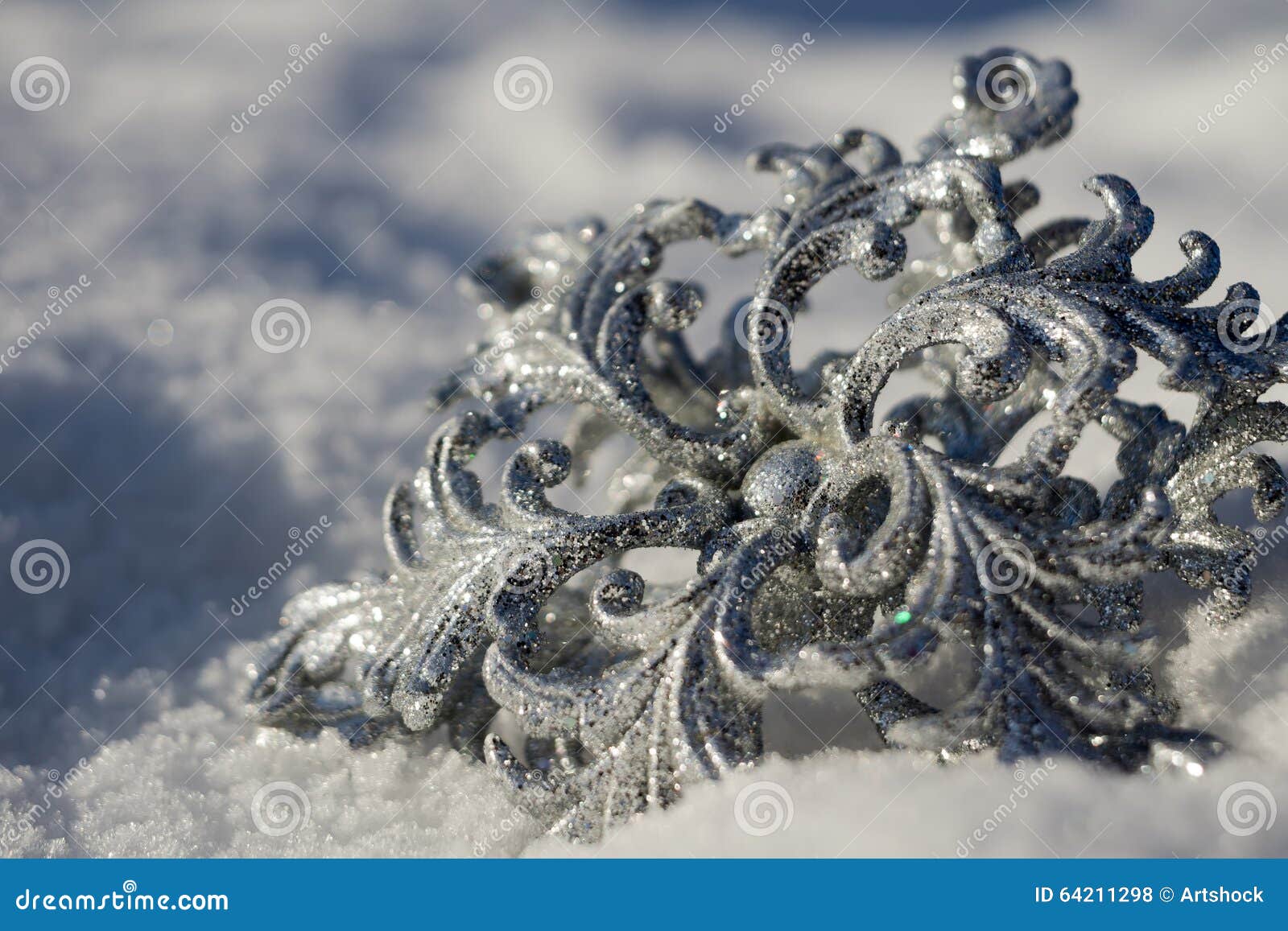Silver Snowflake on Snow stock photo. Image of sparkle - 64211298