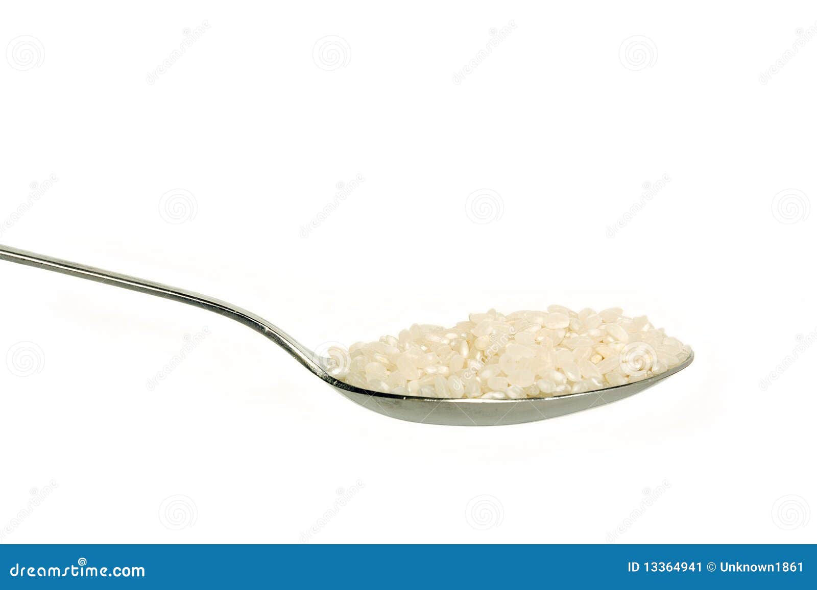 Silver spoon with rice stock image. Image of metal, uncooked - 13364941
