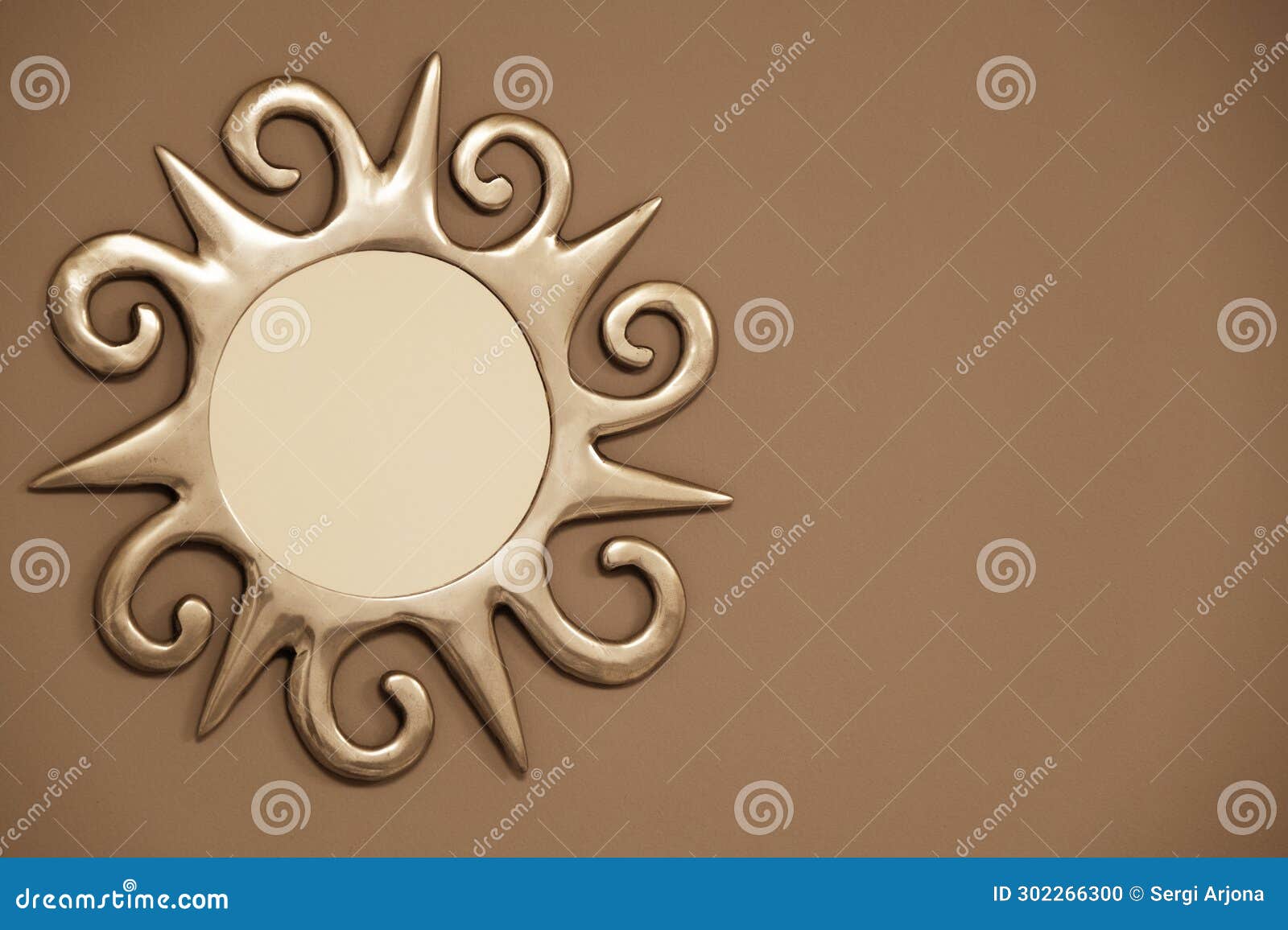 Silver Sun-shaped Mirror on a Gray Wall Stock Photo - Image of ...