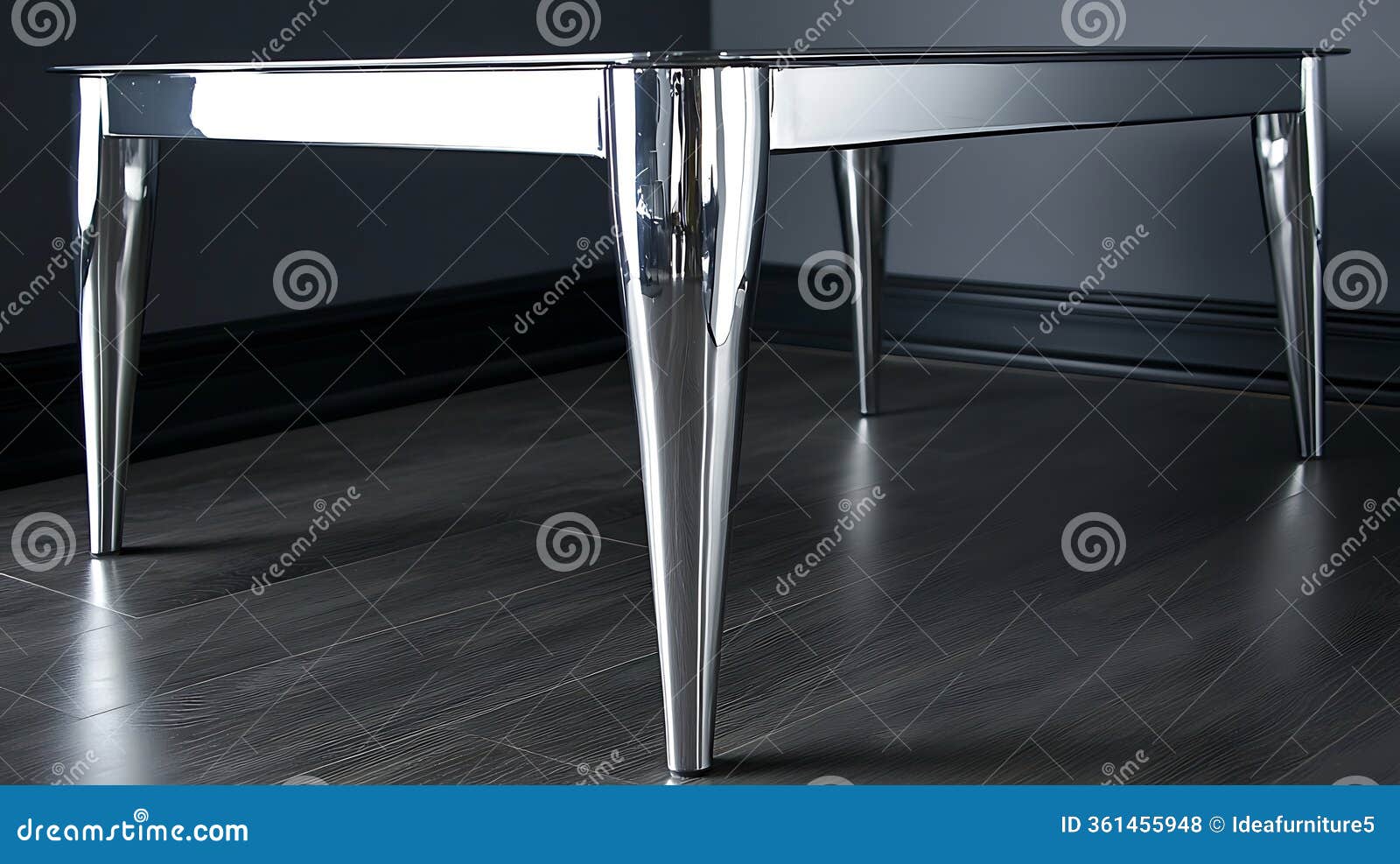 A Silver Table with Legs that are Curved and Pointed Stock Photo ...