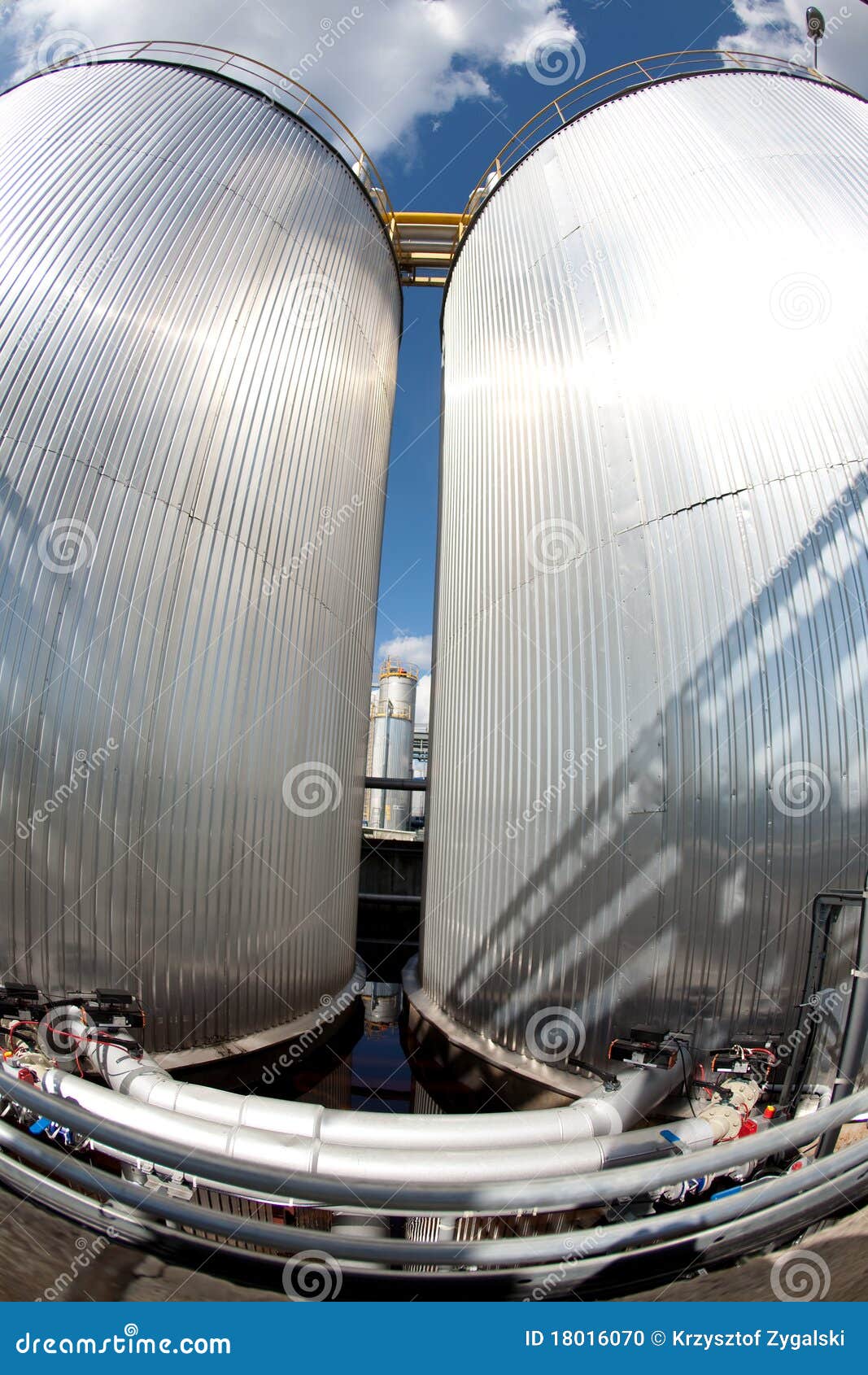 Silver tanks and pipelines stock photo. Image of structure - 18016070