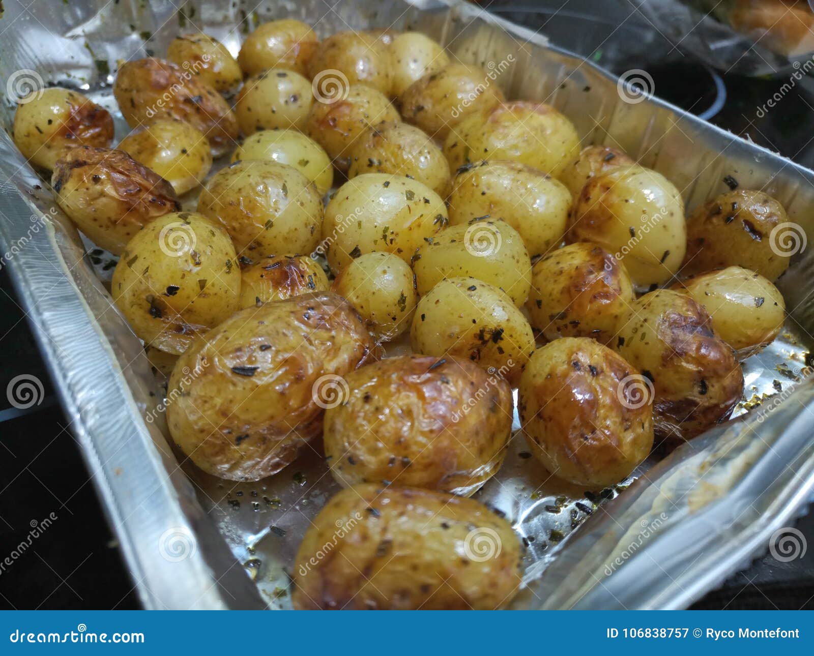 Small round roast potatoes stock image. Image of tray - 106838757