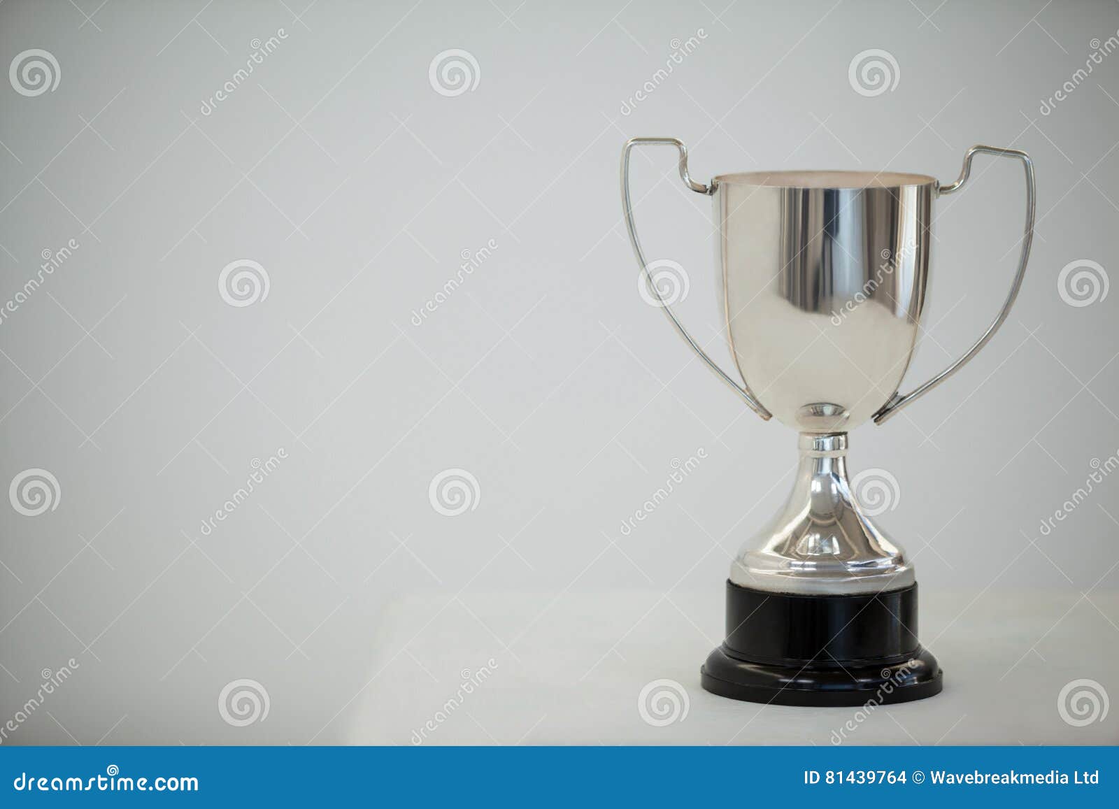Silver Trophy on Grey Background Stock Photo - Image of studio ...