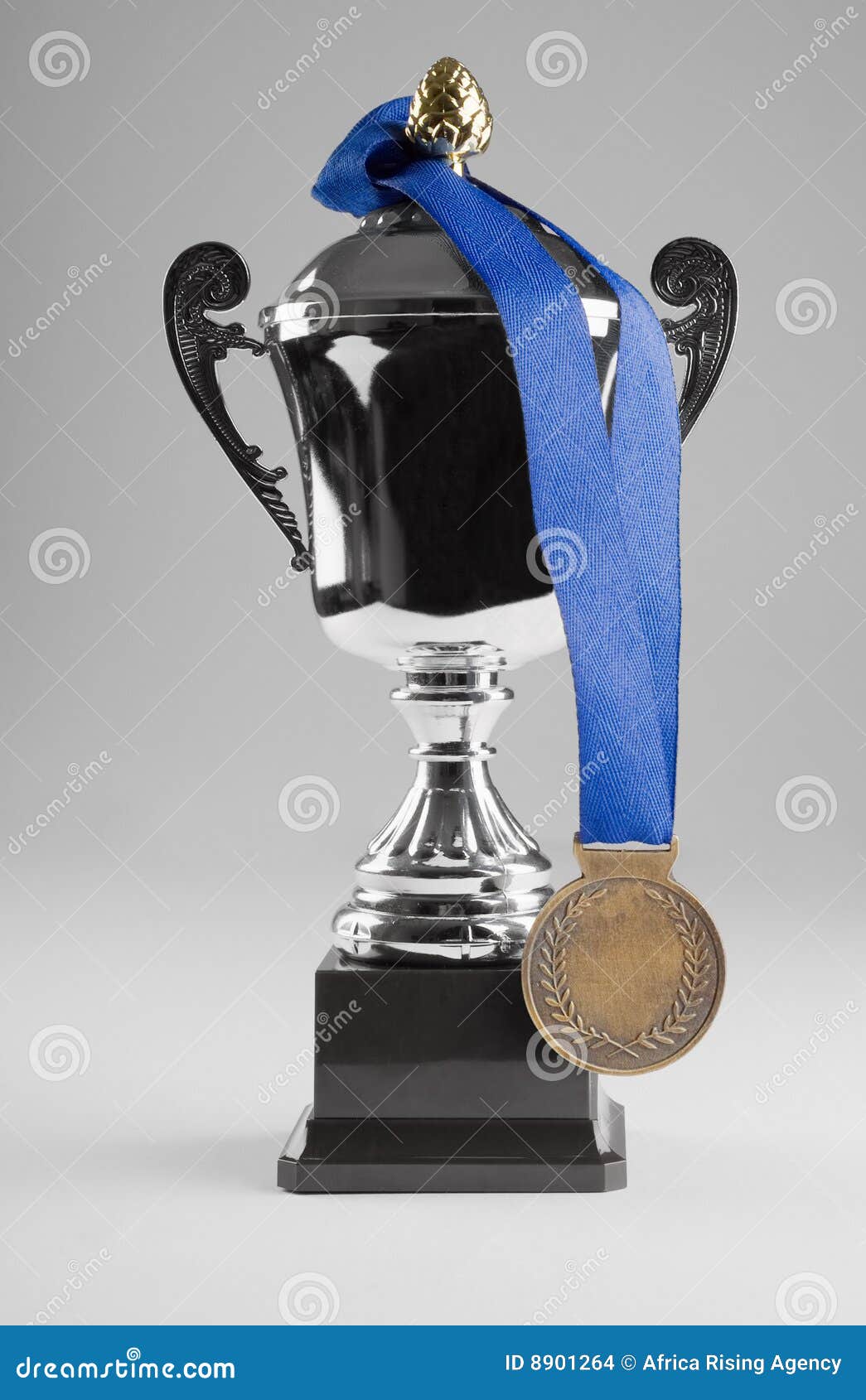 Silver trophy with medal stock photo. Image of blue, background - 8901264