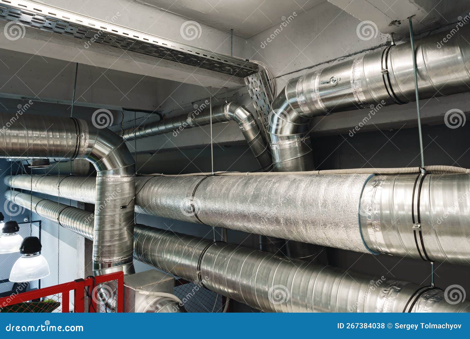 Silver Ventilation Pipes Hanging from the Ceiling Inside the Building ...