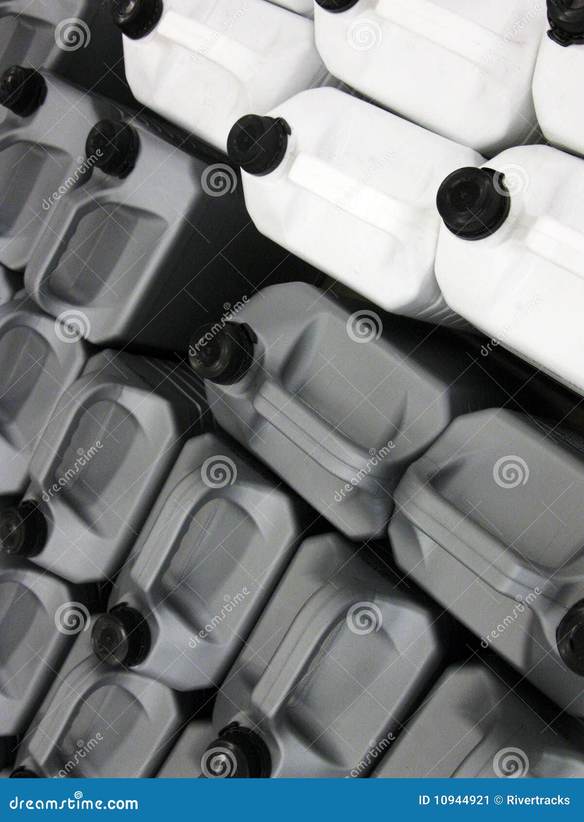 Silver and White Plastic Oil Containers Stock Image - Image of plastic ...