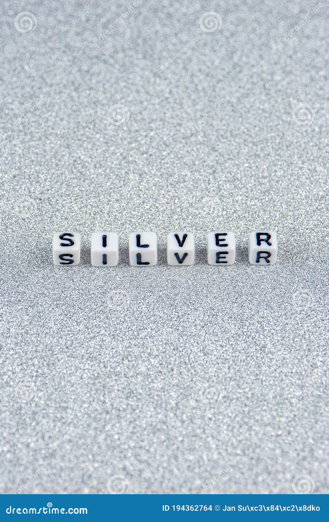 Silver Word Formed by White Dices with Black Letters Laying on Silver ...