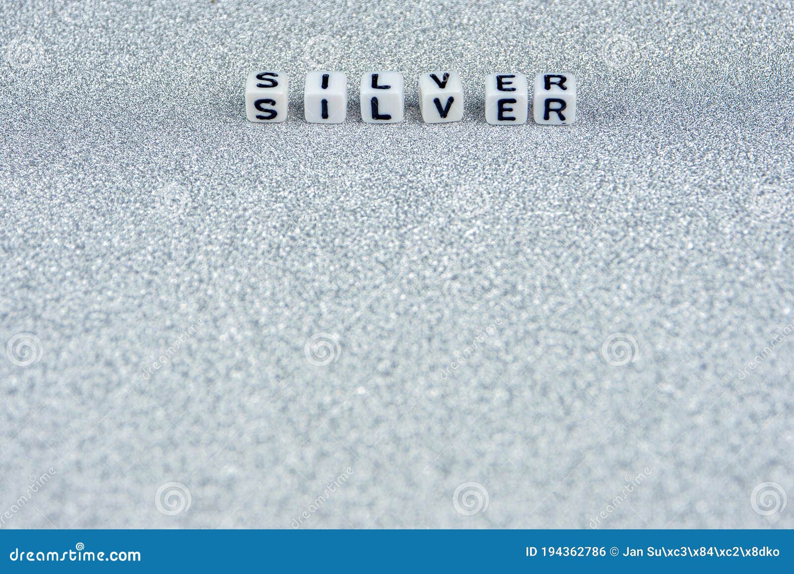 Silver Word Formed by White Dices with Black Letters Laying on Silver ...
