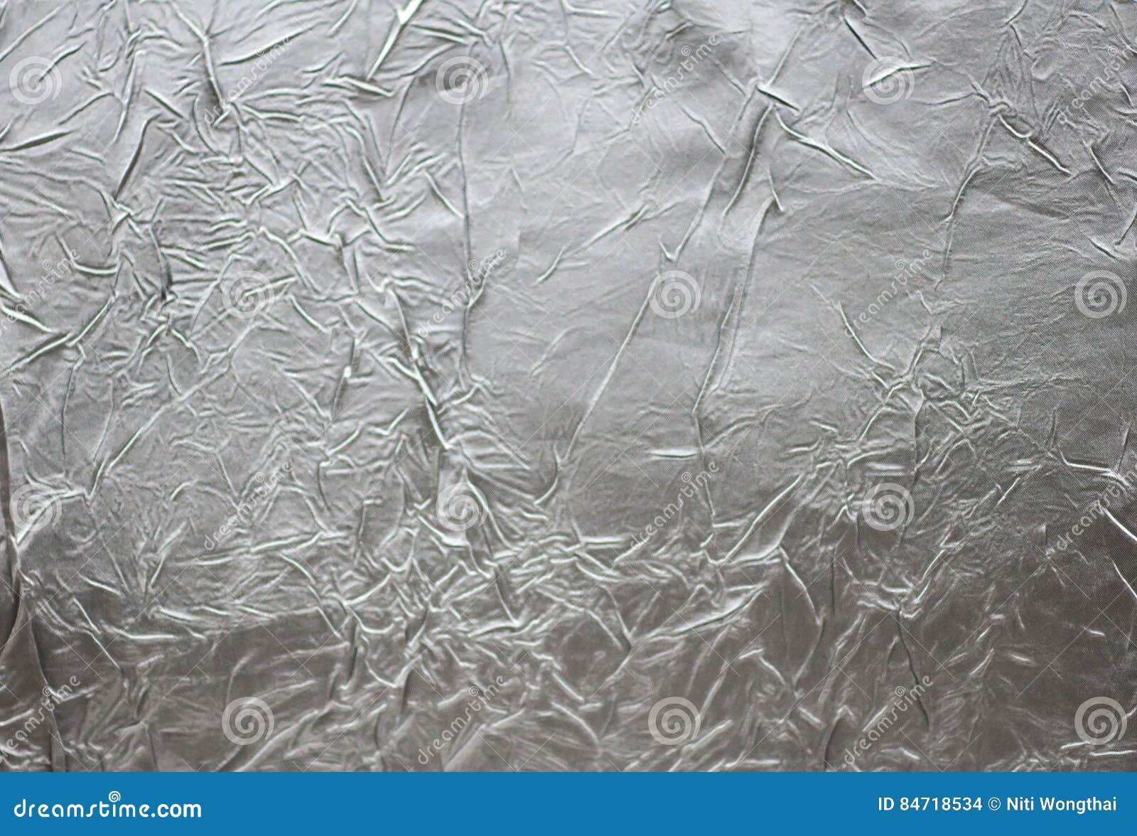 Silver Wrinkled Sheet Metal is Light, Abstract Images. Stock Photo ...