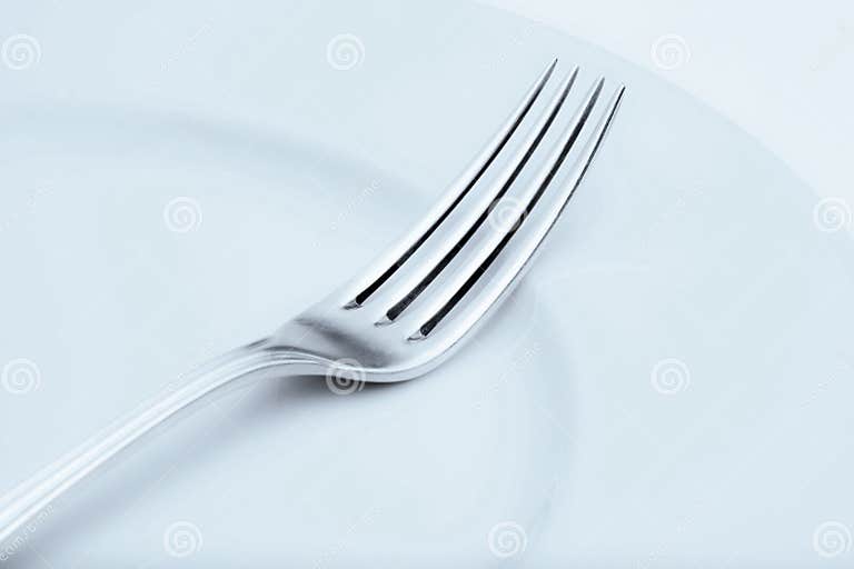 Silverware - Closeup of a Fork Stock Image - Image of metal, porcelain ...