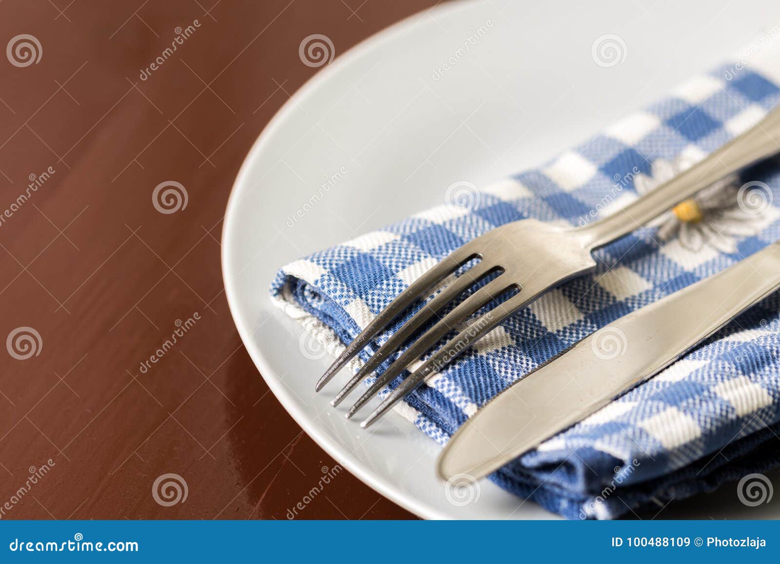 Silverware on the Plate, Metal Fork and Knife with Dishcloth on Stock ...