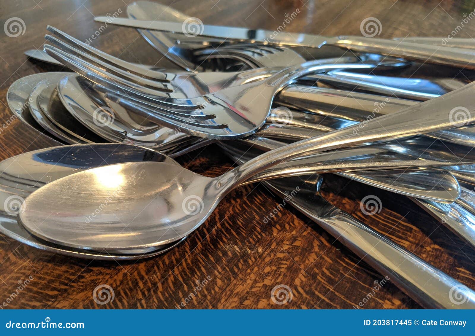 Silverware on wood table stock image. Image of fork - 203817445