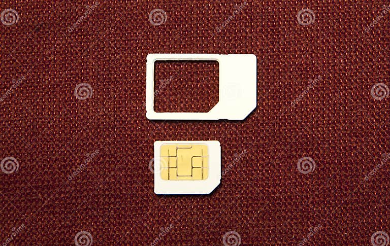 SIM card micro on brown stock photo. Image of internet - 44566682