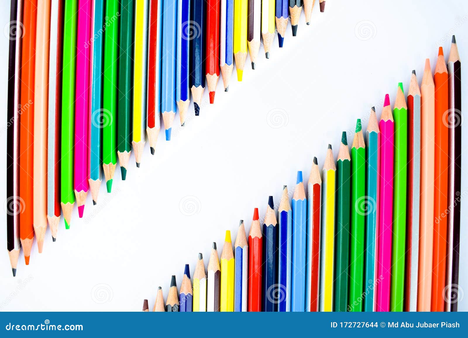 Similar Row of Different Colored Pencil Facing Each Other on a White ...