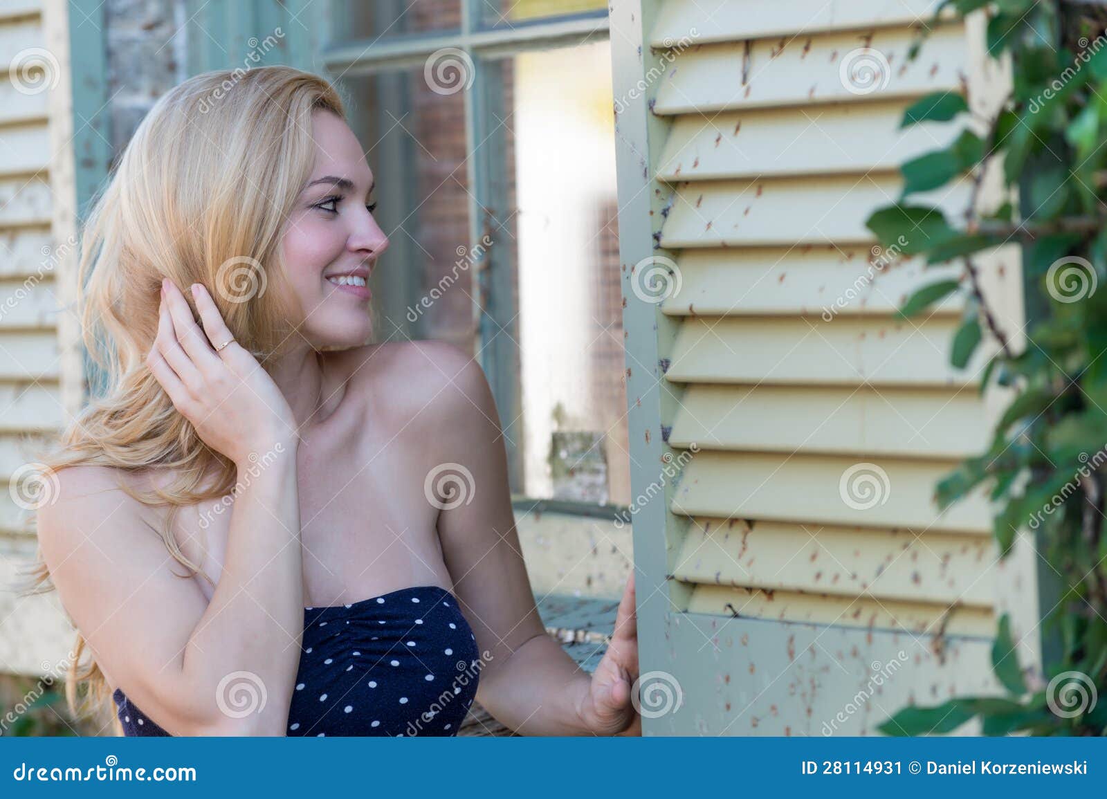 Similing Woman Looking through a Window Stock Image - Image of smiling ...