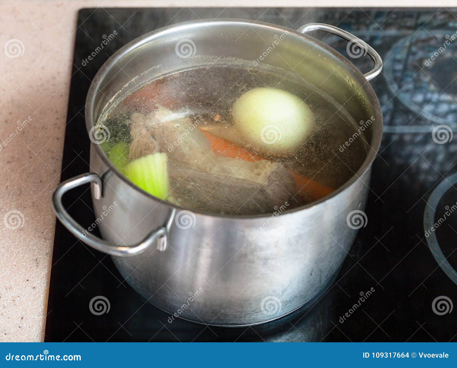 Simmering Meat Broth in Stockpot on Ceramic Cooker Stock Photo - Image ... Simmering Meat Broth in Stockpot on Ceramic Cooker Stock Photo - Image ...