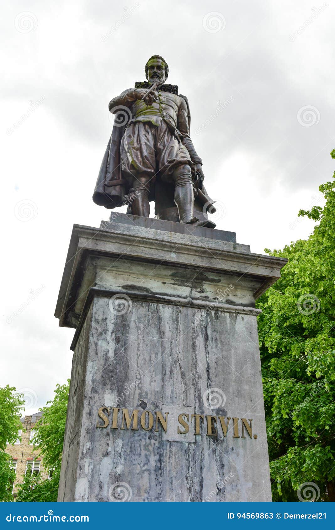 Simon Stevin Bronze Statue In Bruges With Park And Church As Background ...