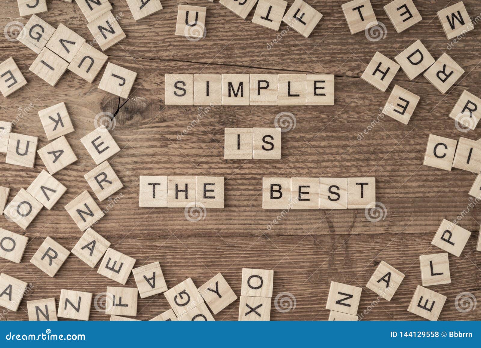 Simple is the Best Slogan Written with Cube Letters Stock Photo - Image ...