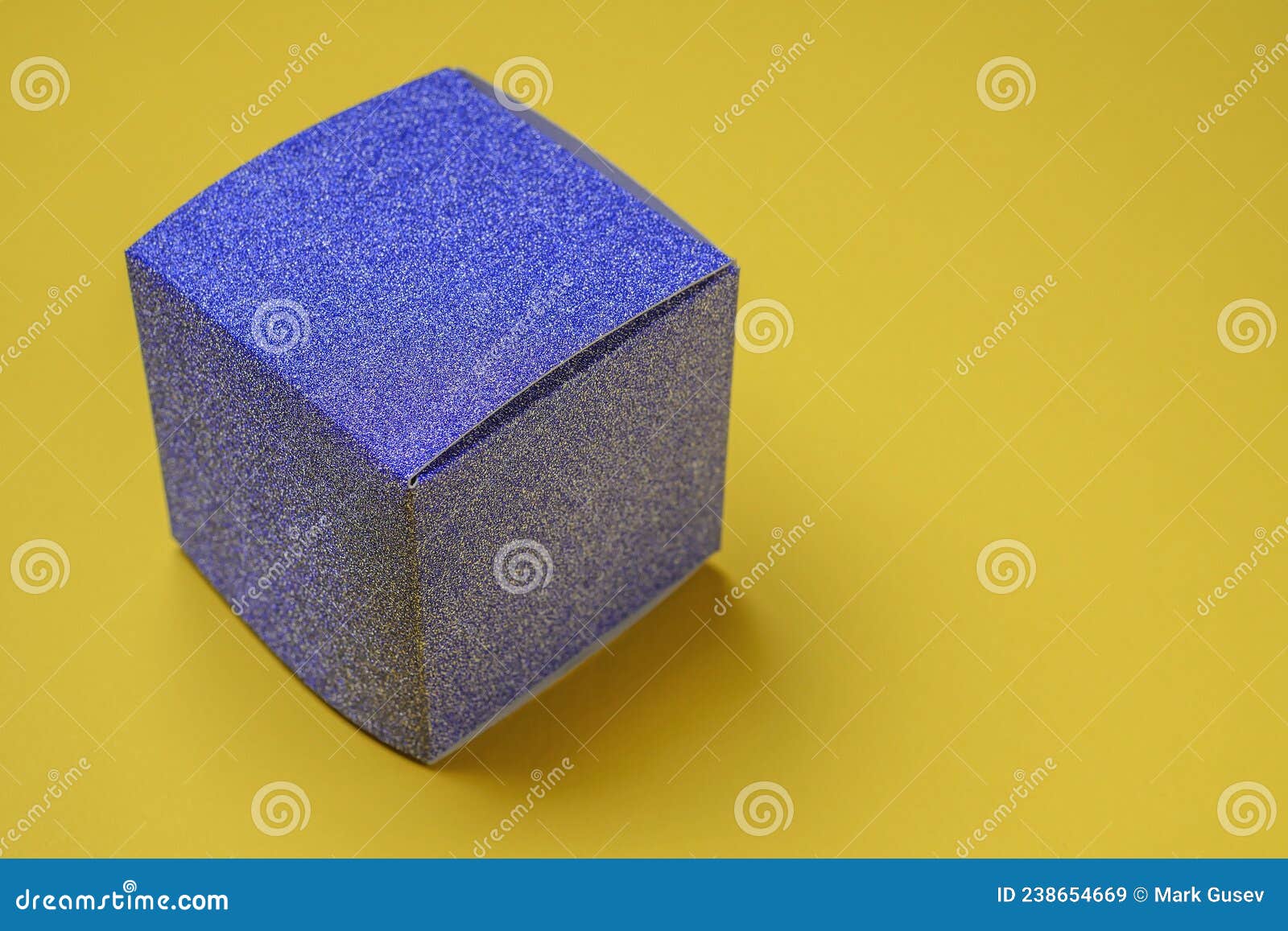 Simple Blue Small Gift Box on Yellow Background Stock Image - Image of ...