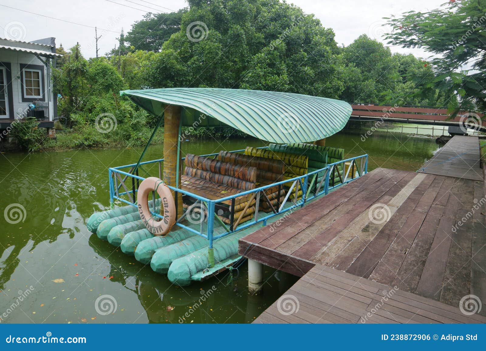 A Simple Boat on the Edge of the Swamp Stock Photo - Image of blue ...