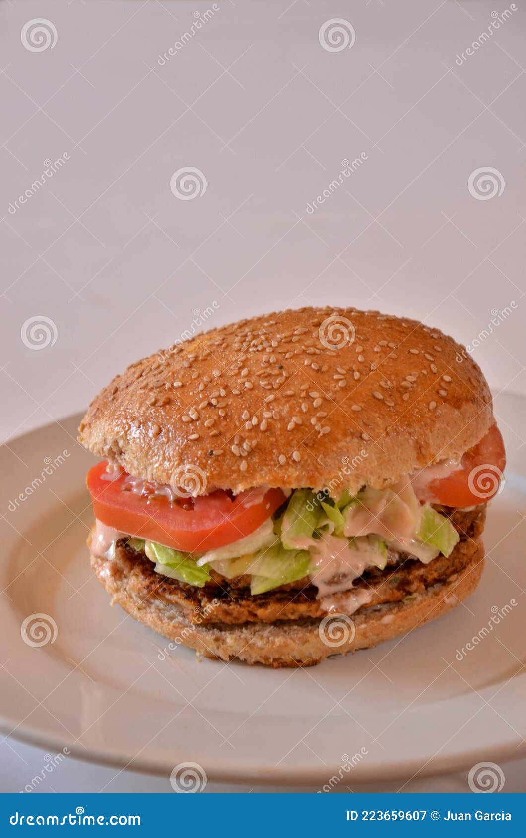 Simple Burger stock image. Image of restaurant, dish - 223659607