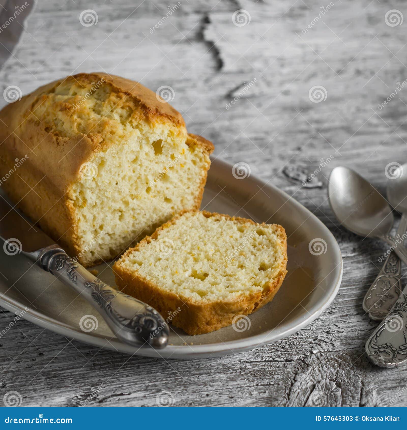 Simple Cake on an Oval Plate Stock Image - Image of orange, cutting ...