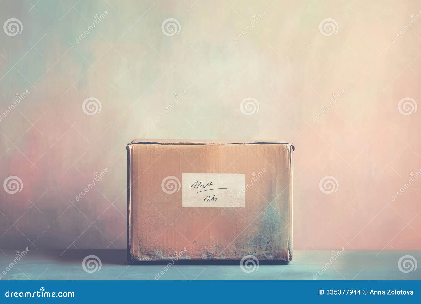 A Simple Cardboard Moving Package with a Handwritten Label Placed on a ...