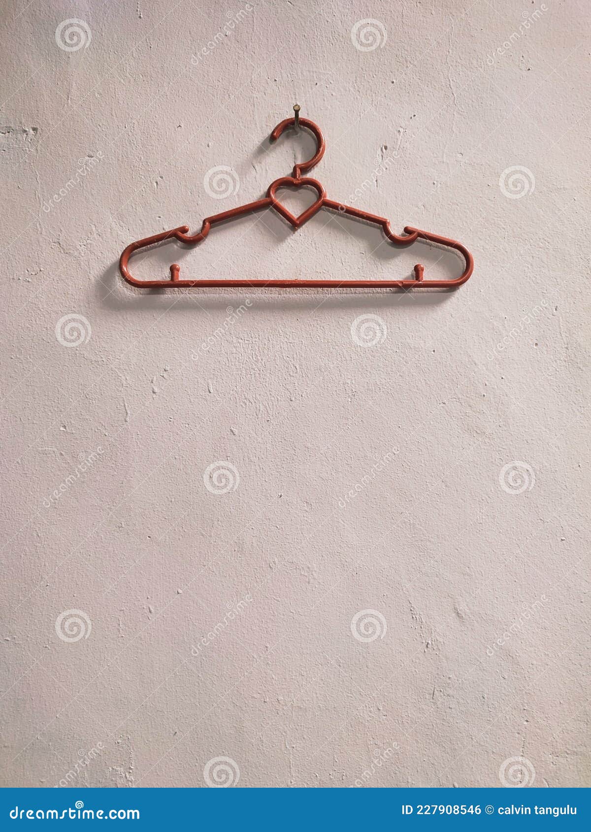Simple Clothes Hanger on the Wall Stock Photo - Image of simple ...