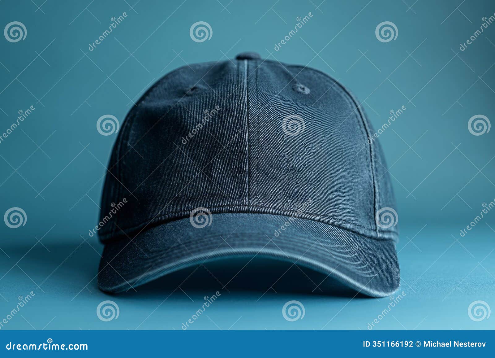 Simple Dark Blue Baseball Cap Product Shot Against a Plain Background ...