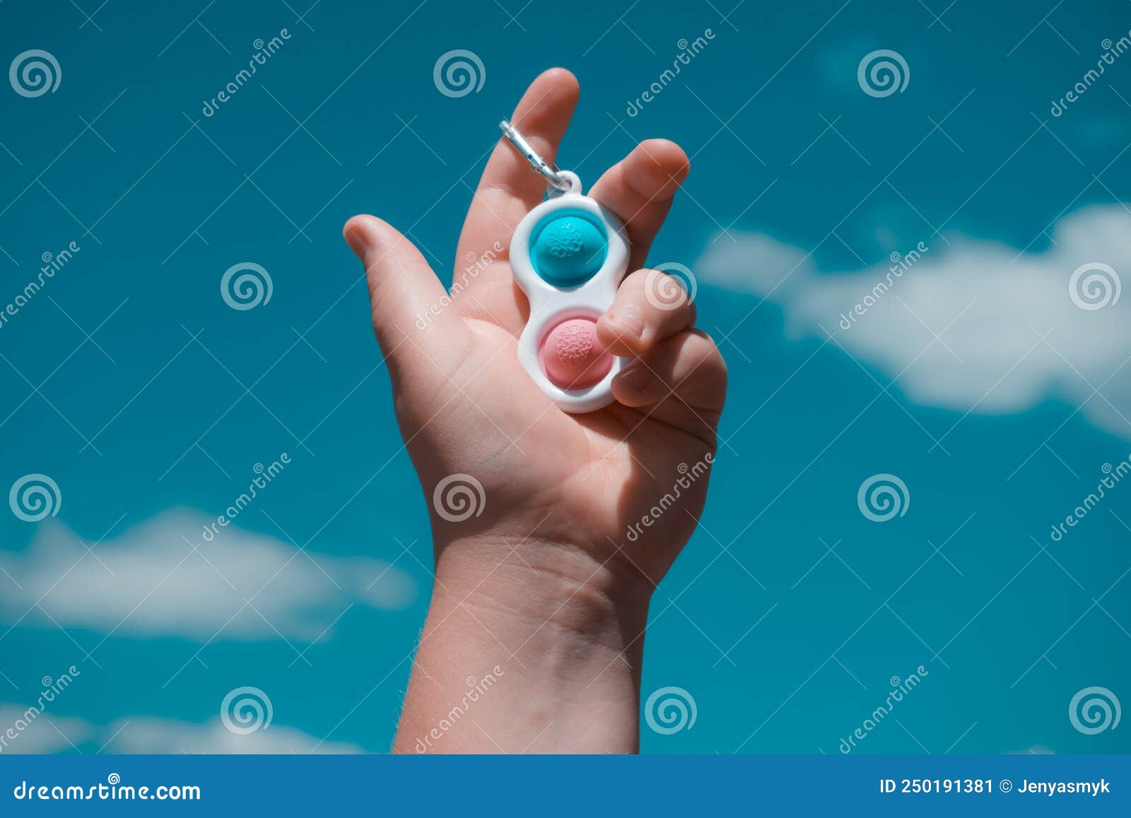 Simple Dimple in the Hands of a Child. Stock Image - Image of hand ...