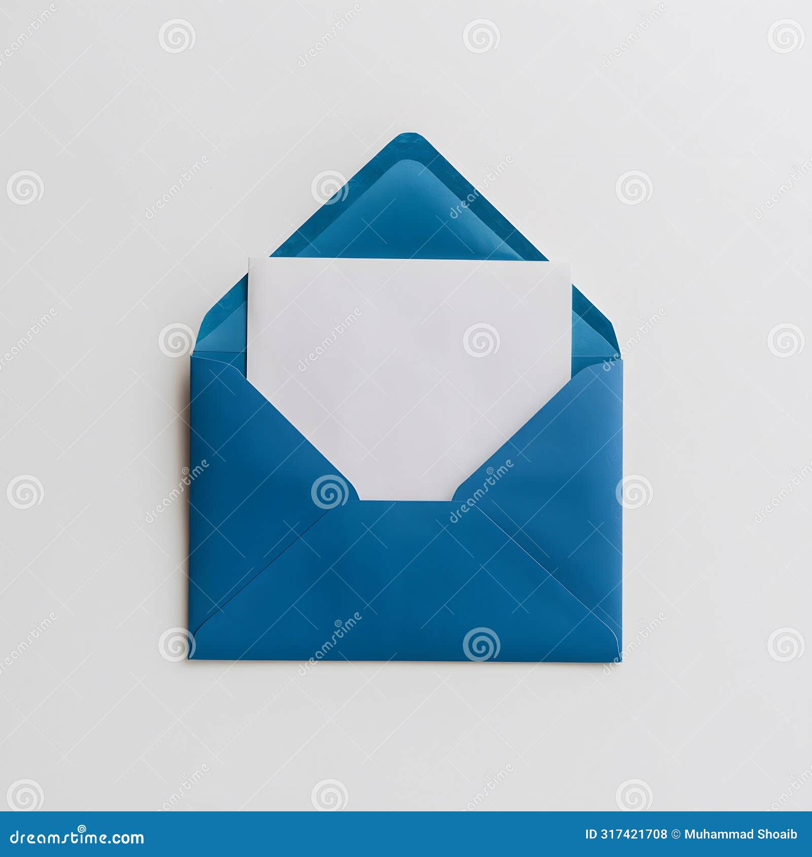 Simple Elegance: Open Blue Envelope with White Letter Against Plain ...
