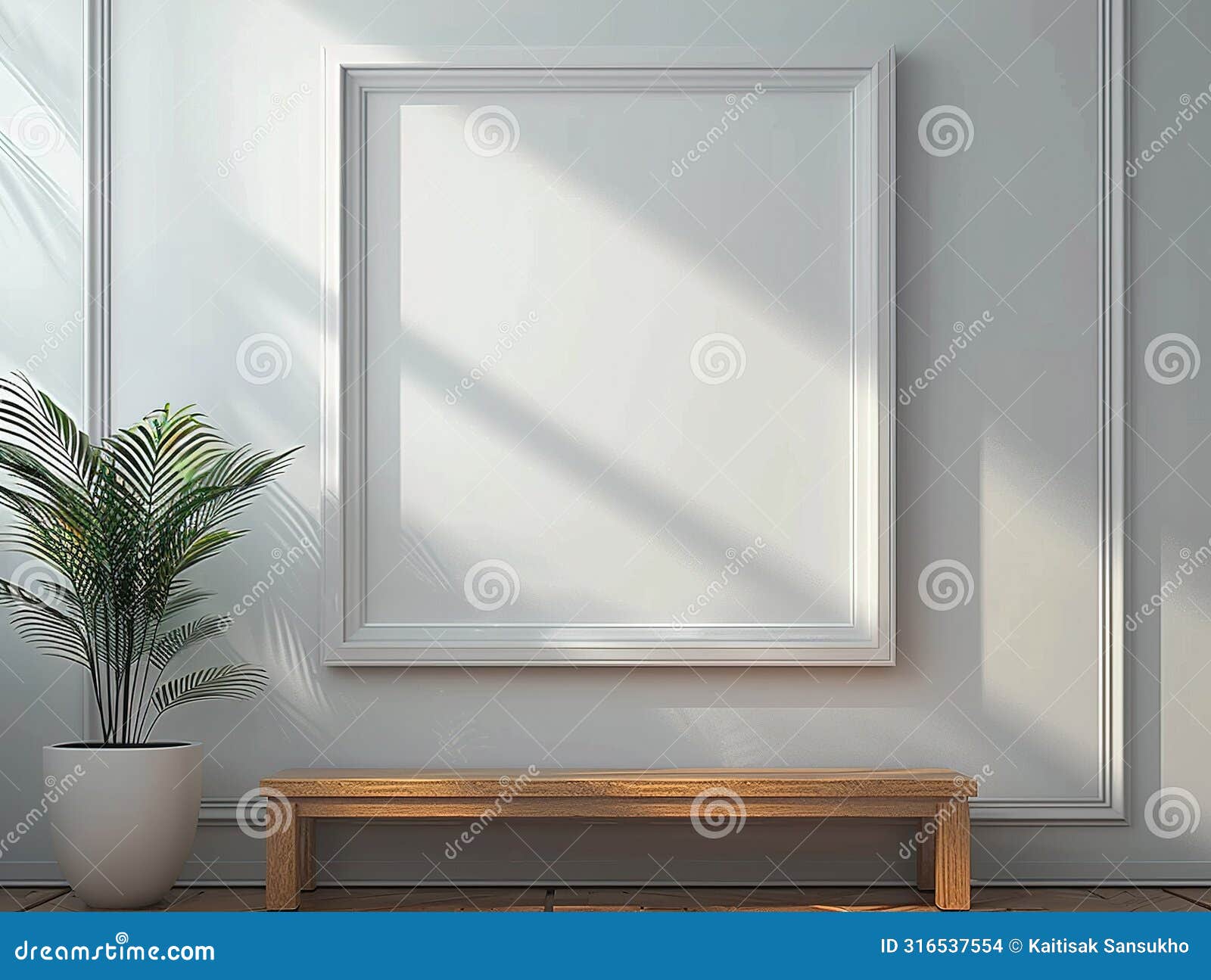 The Image Shows a Large Empty Frame on a White Wall Next To a Potted ...