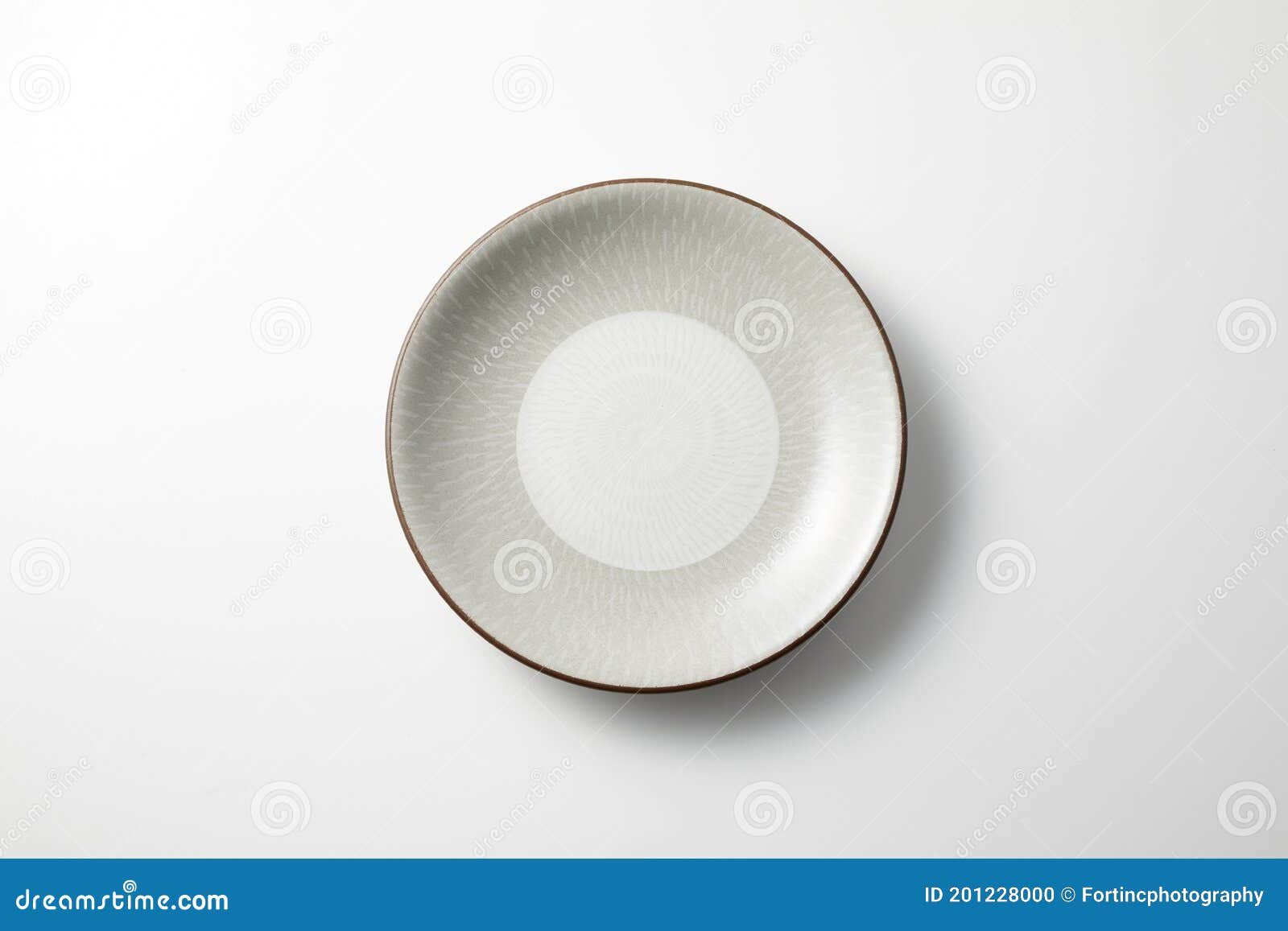 Simple and empty plate stock photo. Image of brown, plates - 201228000