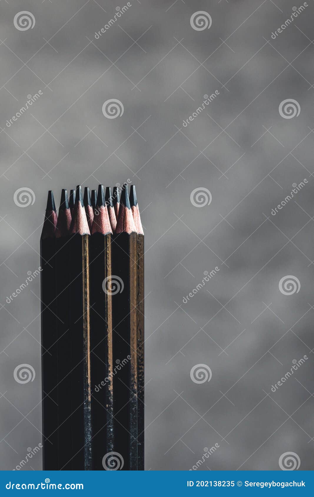 Simple Graphite Pencils on Grey Background. Black Pencils, Space for ...