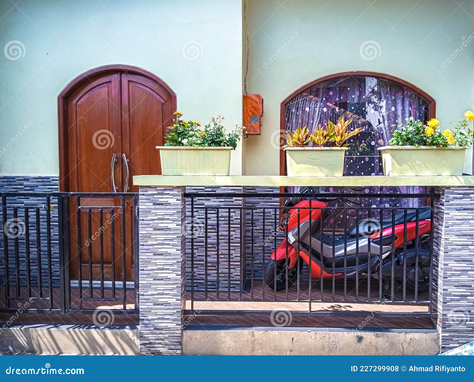A Simple House with Long Doors and Wide Windows Stock Photo - Image of ...