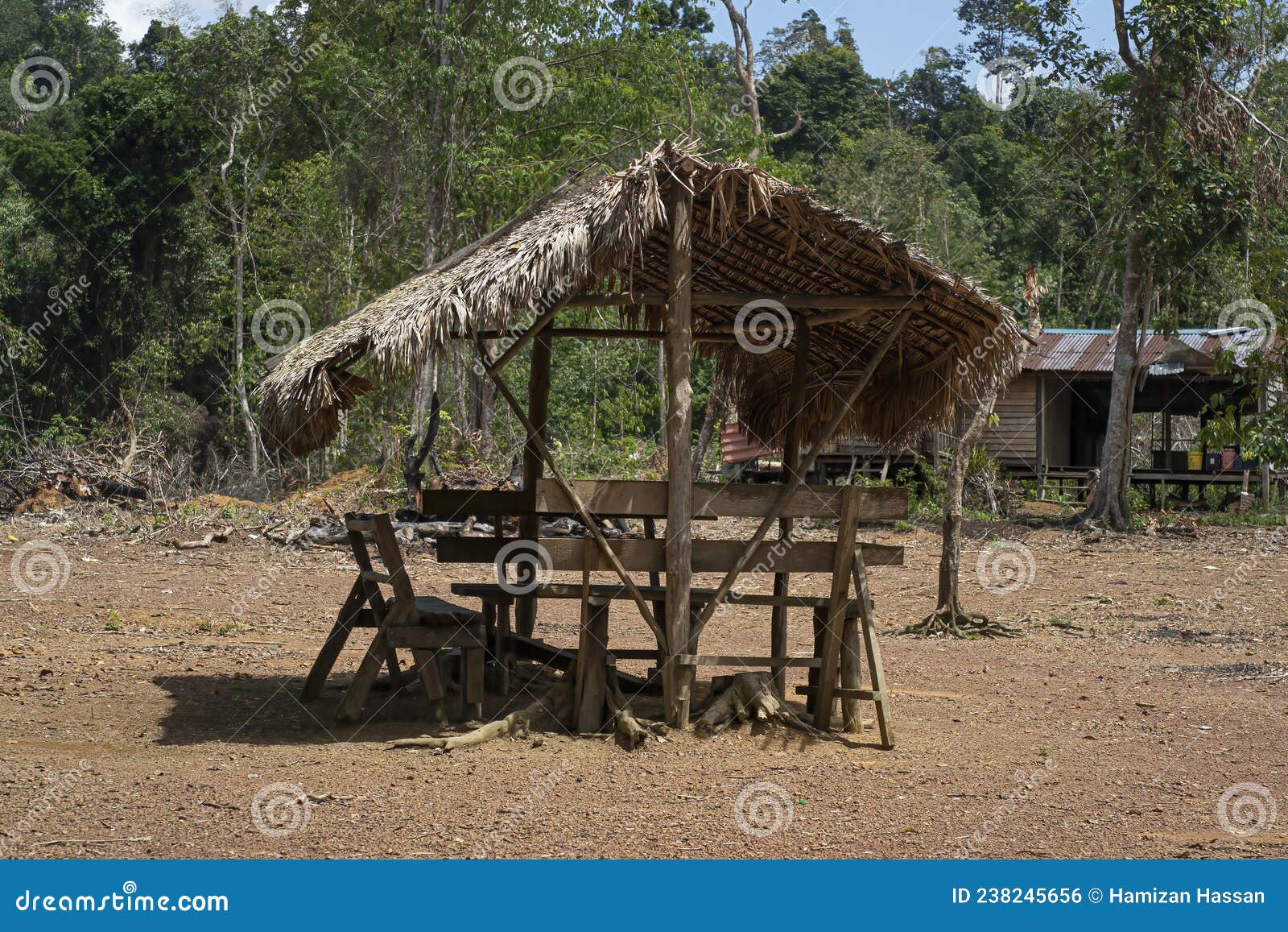 Simple hut with benches stock photo. Image of rustic - 238245656