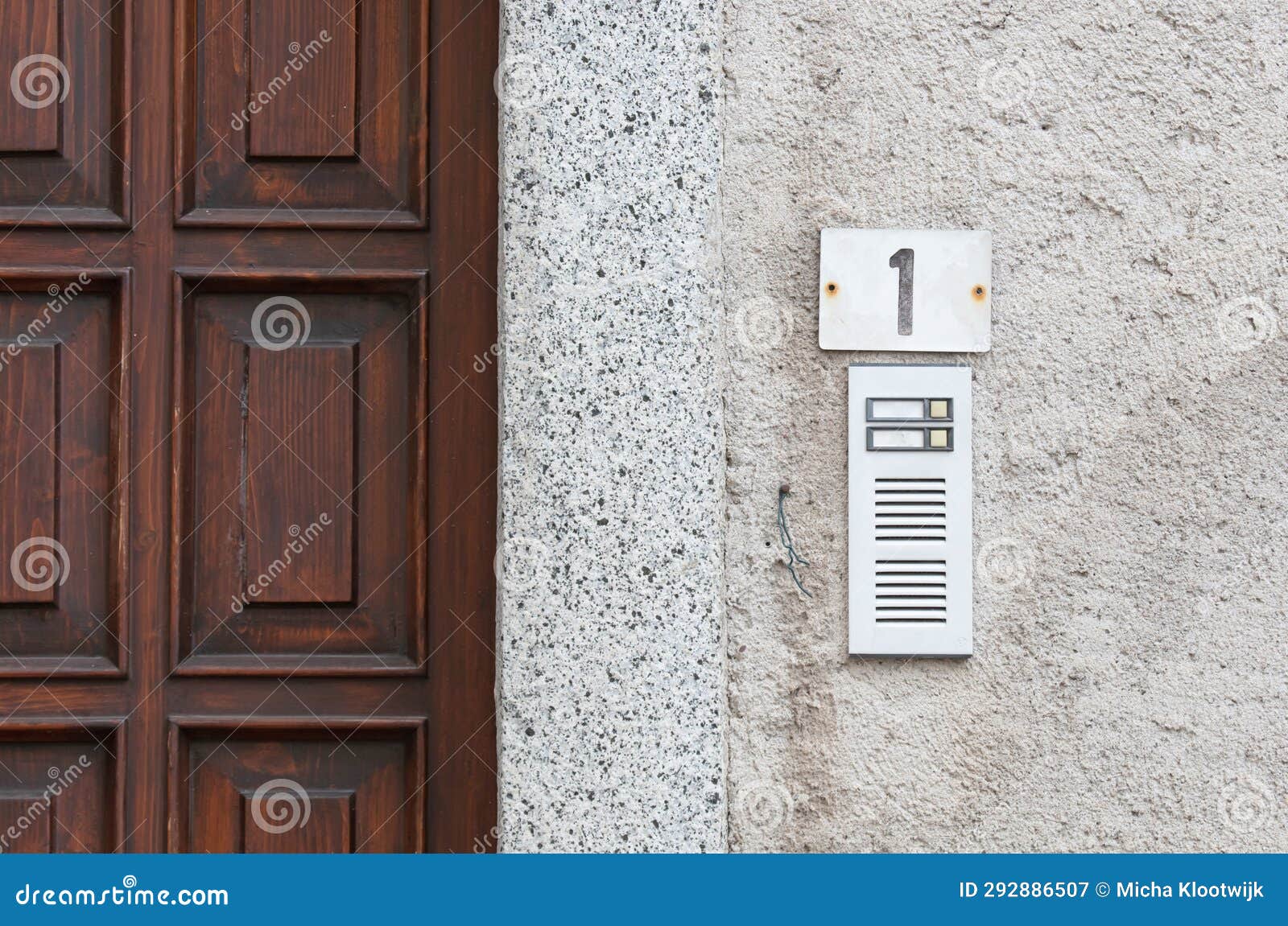 Simple Intercom System Next To a Wooden Door Stock Image - Image of ...