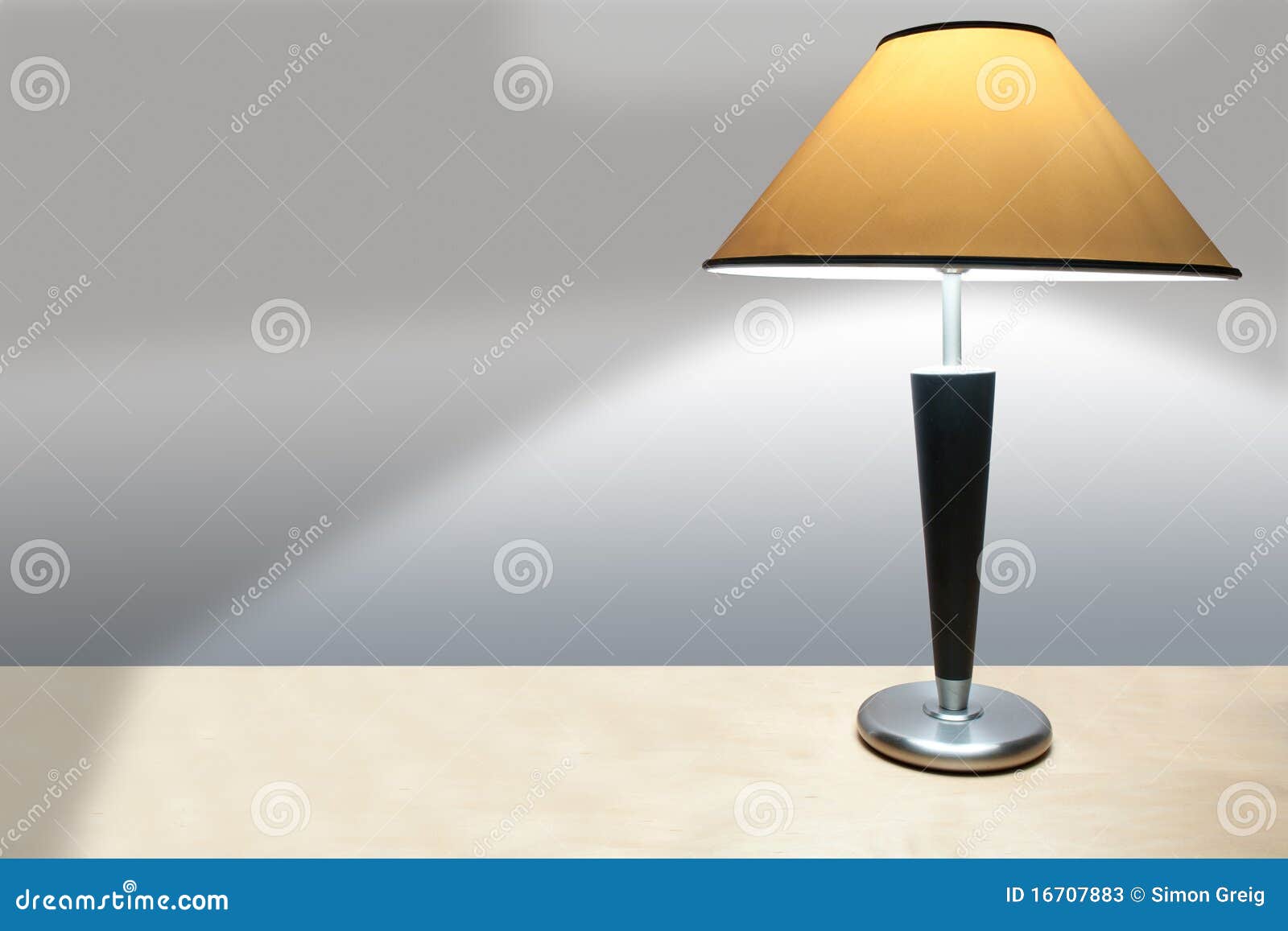 Simple Lamp on a Desk Casting a Shadow Stock Image - Image of copyspace ...
