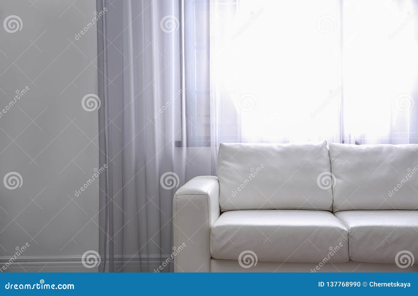 Simple Living Room Interior with Comfortable Sofa Near Window Stock ...