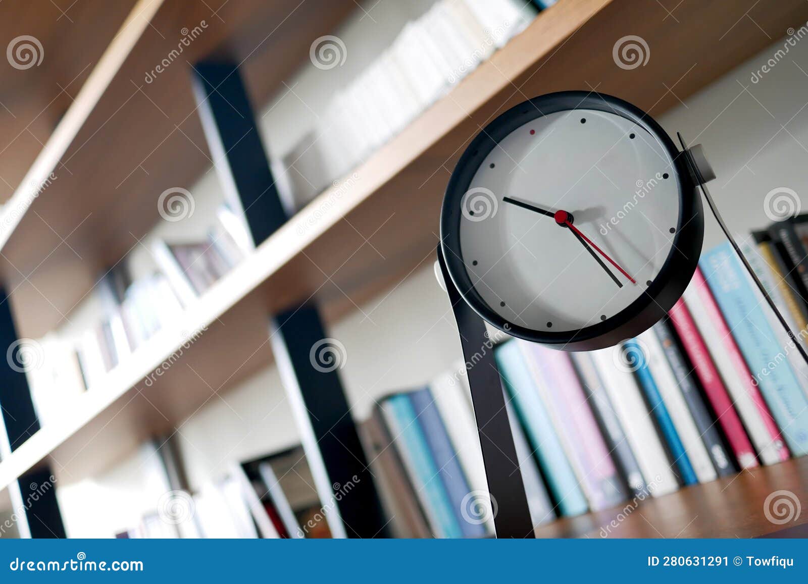 Simple Modern Clock on a Book Shelf . Stock Image - Image of aluminum ...