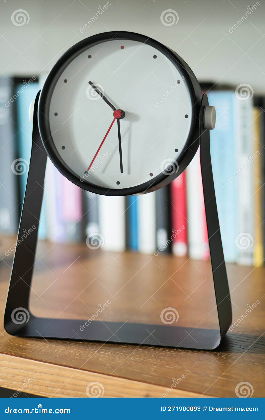 Simple Modern Clock on a Book Shelf . Stock Image - Image of watch ...