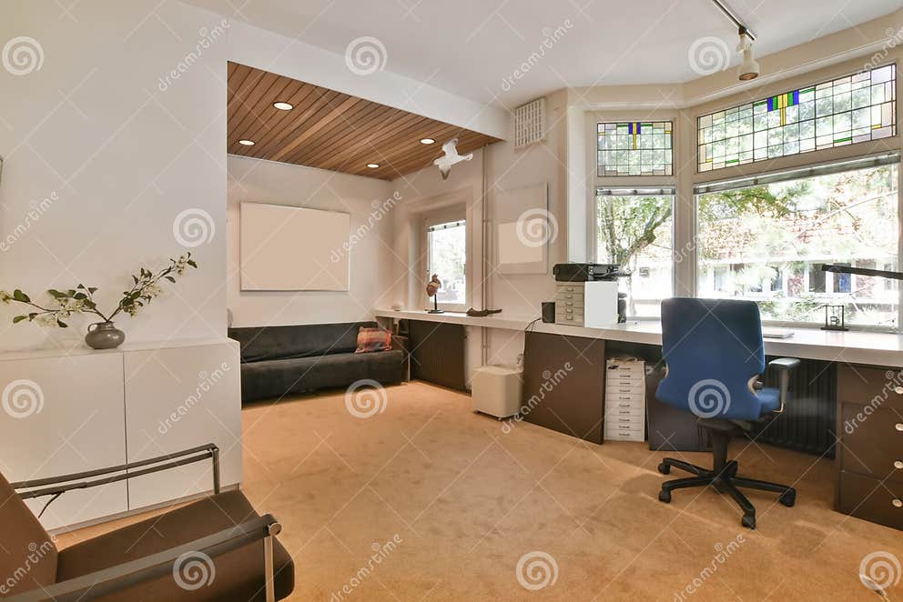 Simple lounge room stock photo. Image of comfortable - 241816096