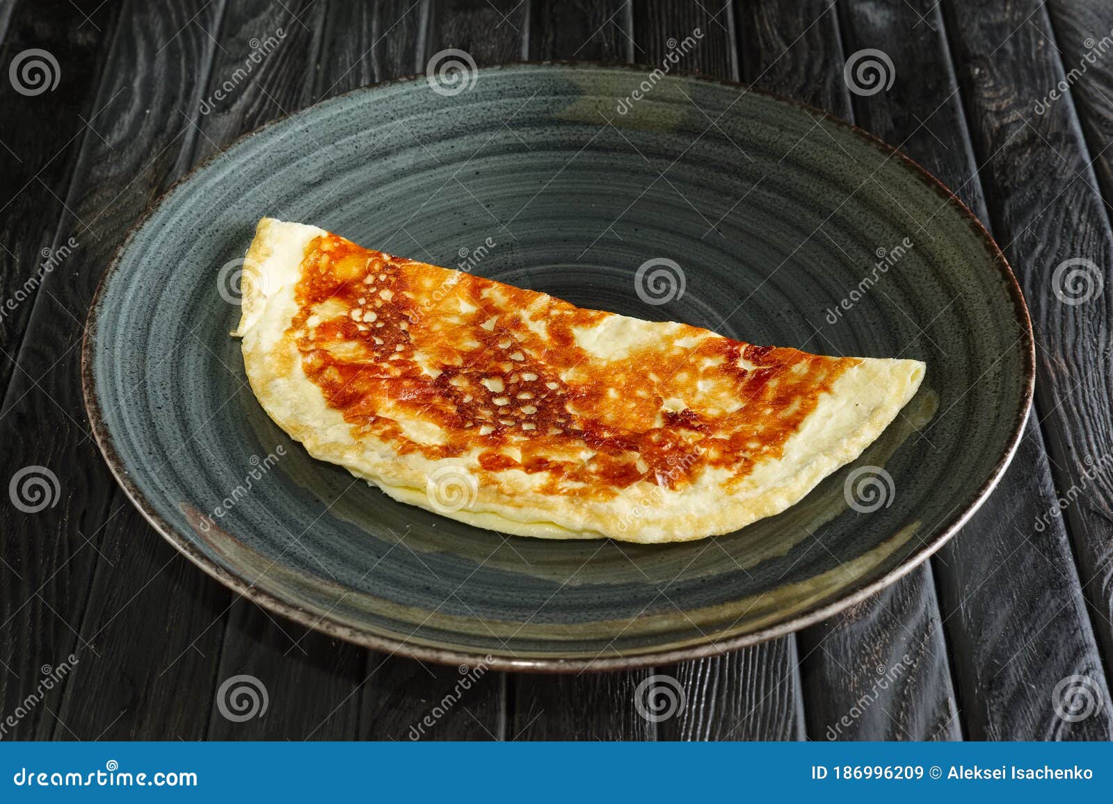 Simple omelet on a plate stock image. Image of italian - 186996209