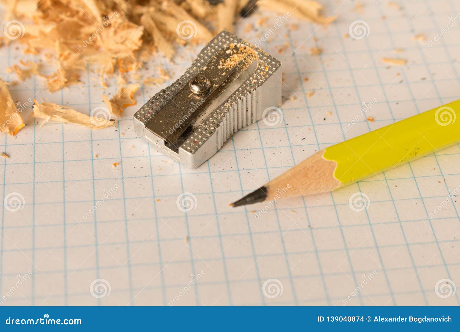 A Simple Pencil and Sharpener on a Clean Sheet of Paper. Selective ...