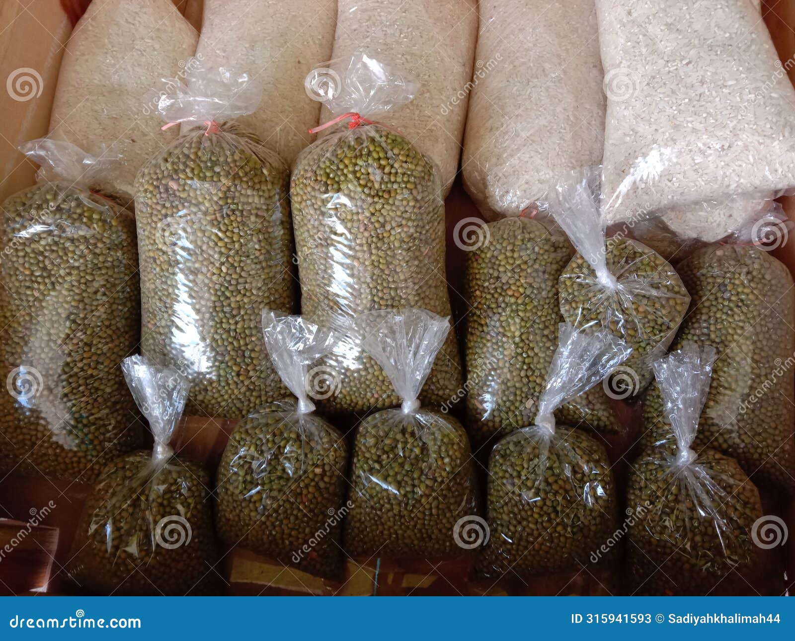 Simple Plastic Packaging for Rice and Green Beans? Stock Image - Image ...